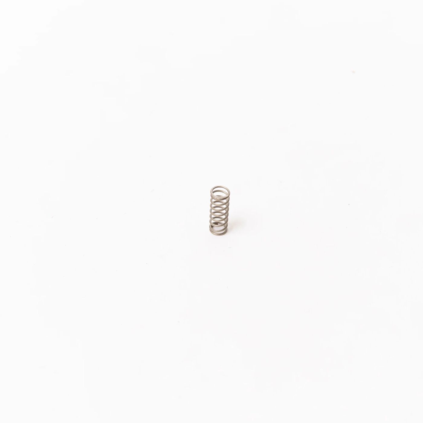 Battery Compartment Cover Release Button Spring (T100/T70P/T25P) YC.JG